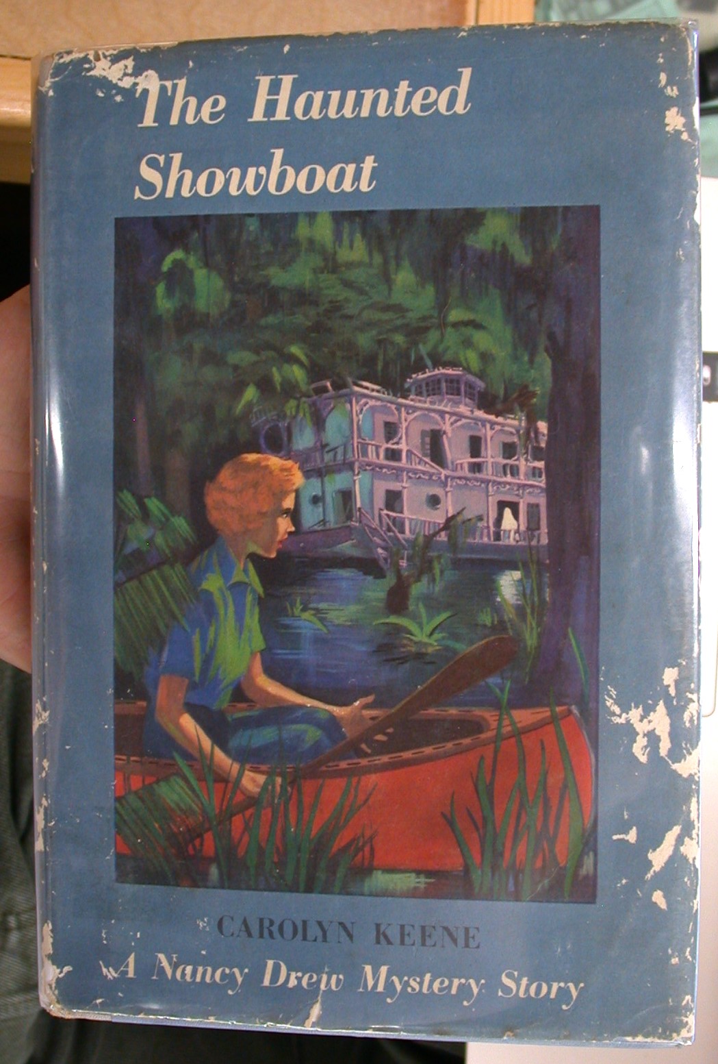 Keene, Carolyn; Bolian, Polly (illustrations): The Haunted Showboat (A ...